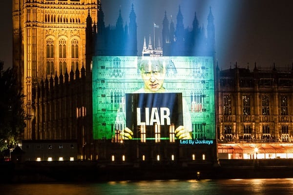 Watch: PM branded a criminal and a ‘liar’ in giant projection on the ...