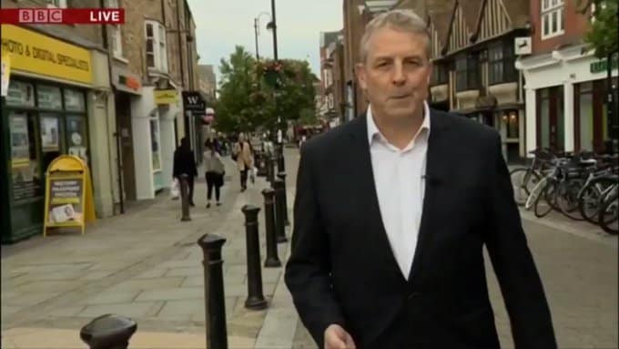 Watch: Moment BBC political editor is interrupted on air by teenager ...